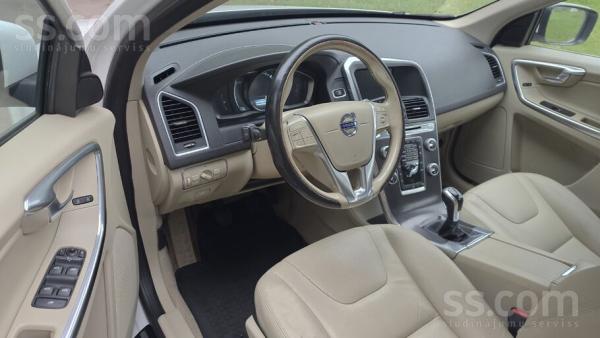 White Volvo XC60 2015 in Riga, with an engine capacity of 2.00 L and mileage of 300 thousand km for 7000 €, photo 8 on AUTOMOTO.COM.LV