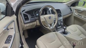 White Volvo XC60 2015 in Riga, with an engine capacity of 2.00 L and mileage of 300 thousand km for 7000 €, photo 8 on AUTOMOTO.COM.LV