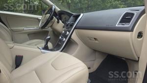 White Volvo XC60 2015 in Riga, with an engine capacity of 2.00 L and mileage of 300 thousand km for 7000 €, photo 9 on AUTOMOTO.COM.LV