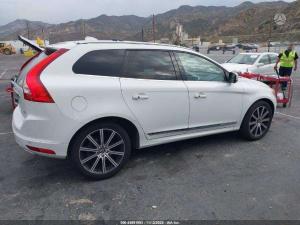 White Volvo XC60 2016 in Vilnius, with an engine capacity of 1.97 L and mileage of 168 thousand km for 9330 €, photo 5 on AUTOMOTO.COM.LV