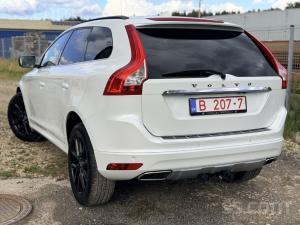 White Volvo XC60 2016 in Riga, with an engine capacity of 2.00 L and mileage of 247 thousand km for 13995 €, photo 3 on AUTOMOTO.COM.LV