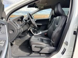 White Volvo XC60 2016 in Riga, with an engine capacity of 2.00 L and mileage of 247 thousand km for 13995 €, photo 10 on AUTOMOTO.COM.LV