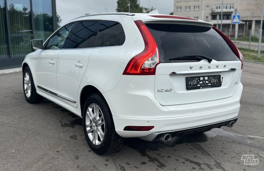 White Volvo XC60 2016 in Kretinga, with an engine capacity of 2.00 L and mileage of 314 thousand km for 9950 €, photo 10 on AUTOMOTO.COM.LV