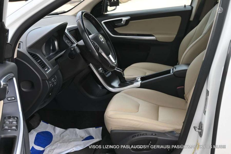 White Volvo XC60 2016 in Kretinga, with an engine capacity of 1.97 L and mileage of 238 thousand km for 13699 €, photo 18 on AUTOMOTO.COM.LV