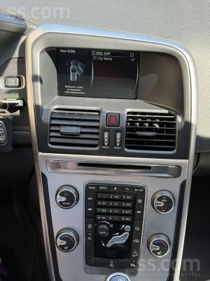 White Volvo XC60 2016 in Riga, with an engine capacity of 2.40 L and mileage of 0 thousand km for 12800 €, photo 8 on AUTOMOTO.COM.LV