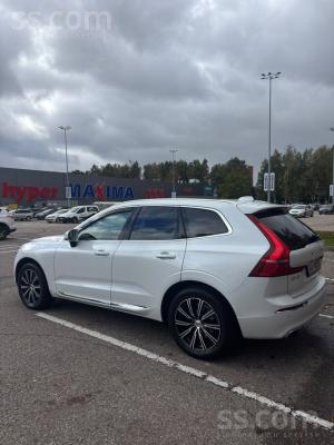 White Volvo XC60 2018 in Riga, with an engine capacity of 2.00 L and mileage of 240 thousand km for 21800 €, photo 4 on AUTOMOTO.COM.LV
