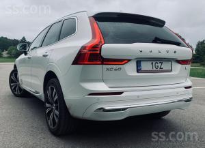 White Volvo XC60 2021 in Riga, with an engine capacity of 2.00 L and mileage of 129 thousand km for 29900 €, photo  on AUTOMOTO.COM.LV