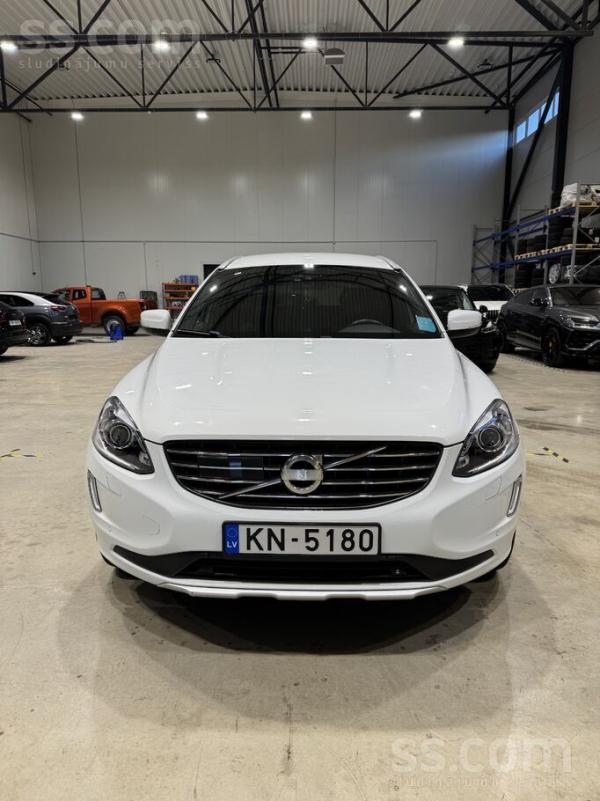 White Volvo XC60 2013 in Riga, with an engine capacity of 2.40 L and mileage of 300 thousand km for 13000 €, photo 1 on AUTOMOTO.COM.LV