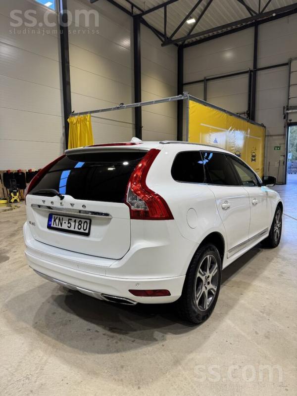 White Volvo XC60 2013 in Riga, with an engine capacity of 2.40 L and mileage of 300 thousand km for 13000 €, photo 6 on AUTOMOTO.COM.LV