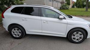 White Volvo XC60 2014 in Panevezys, with an engine capacity of 2.00 L and mileage of 242 thousand km for 9350 €, photo 7 on AUTOMOTO.COM.LV