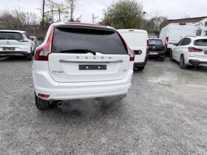 White Volvo XC60 2014 in Riga, with an engine capacity of 2.00 L and mileage of 195 thousand km for 13995 €, photo 3 on AUTOMOTO.COM.LV