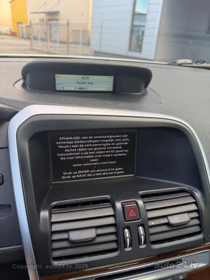 White Volvo XC60 2009 in Tallinn, with an engine capacity of 2.40 L and mileage of 295 thousand km for 6999 €, photo 24 on AUTOMOTO.COM.LV