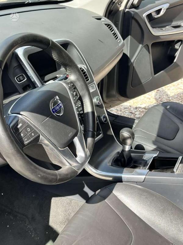 Yellow Volvo XC60 2014 in Kaunas, with an engine capacity of 1.98 L and mileage of 270 thousand km for 11500 €, photo 8 on AUTOMOTO.COM.LV