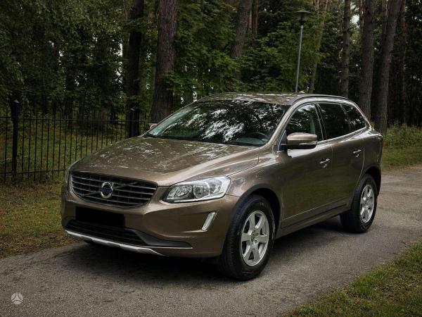Yellow Volvo XC60 2014 in Vilnius, with an engine capacity of 2.40 L and mileage of 218 thousand km for 13900 €, photo 3 on AUTOMOTO.COM.LV