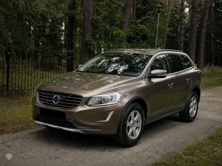 Yellow Volvo XC60 2014 in Vilnius, with an engine capacity of 2.40 L and mileage of 218 thousand km for 13900 €, photo 3 on AUTOMOTO.COM.LV