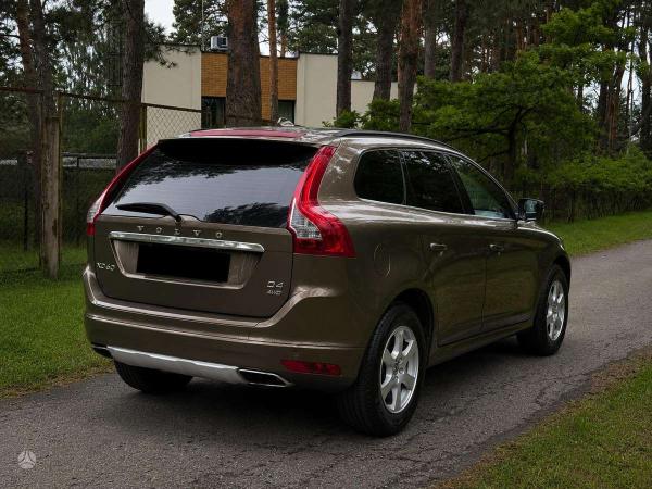 Yellow Volvo XC60 2014 in Vilnius, with an engine capacity of 2.40 L and mileage of 218 thousand km for 13900 €, photo 8 on AUTOMOTO.COM.LV