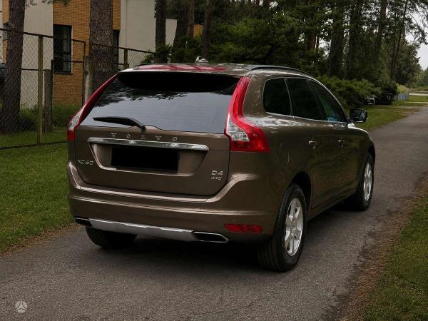 Yellow Volvo XC60 2014 in Vilnius, with an engine capacity of 2.40 L and mileage of 218 thousand km for 13900 €, photo 9 on AUTOMOTO.COM.LV