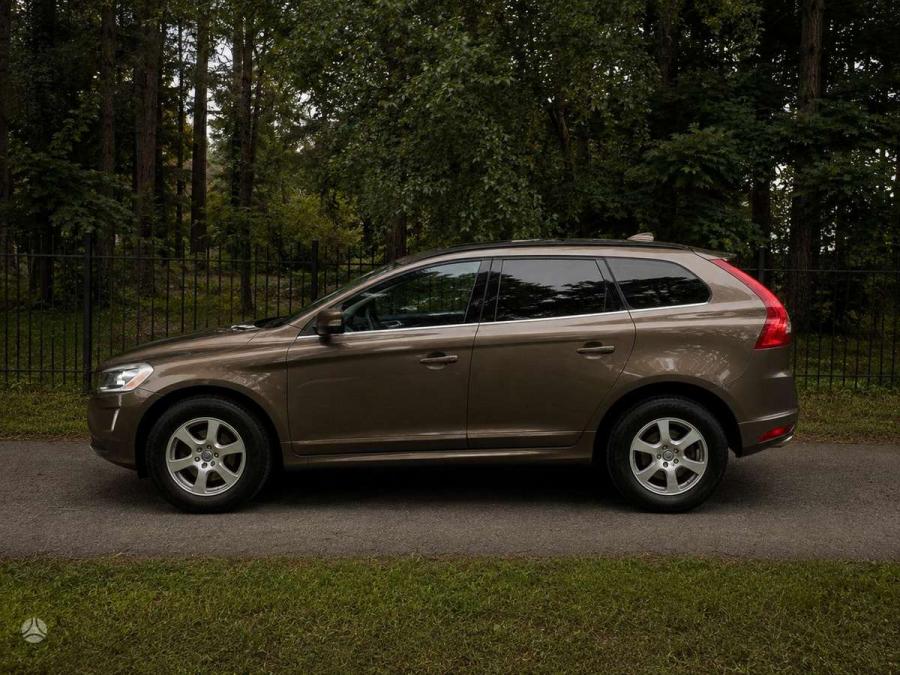 Yellow Volvo XC60 2014 in Vilnius, with an engine capacity of 2.40 L and mileage of 218 thousand km for 13900 €, photo 13 on AUTOMOTO.COM.LV