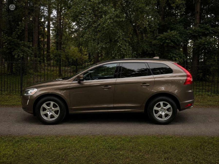 Yellow Volvo XC60 2014 in Vilnius, with an engine capacity of 2.40 L and mileage of 219 thousand km for 13500 €, photo 13 on AUTOMOTO.COM.LV