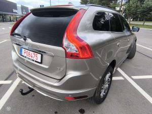 Yellow Volvo XC60 2015 in Utena, with an engine capacity of 2.00 L and mileage of 214 thousand km for 10850 €, photo 6 on AUTOMOTO.COM.LV