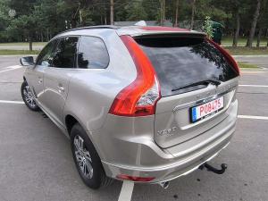 Yellow Volvo XC60 2015 in Utena, with an engine capacity of 2.00 L and mileage of 214 thousand km for 10850 €, photo 13 on AUTOMOTO.COM.LV