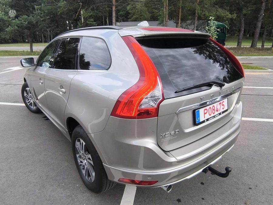 Yellow Volvo XC60 2015 in Utena, with an engine capacity of 2.00 L and mileage of 214 thousand km for 10850 €, photo 13 on AUTOMOTO.COM.LV