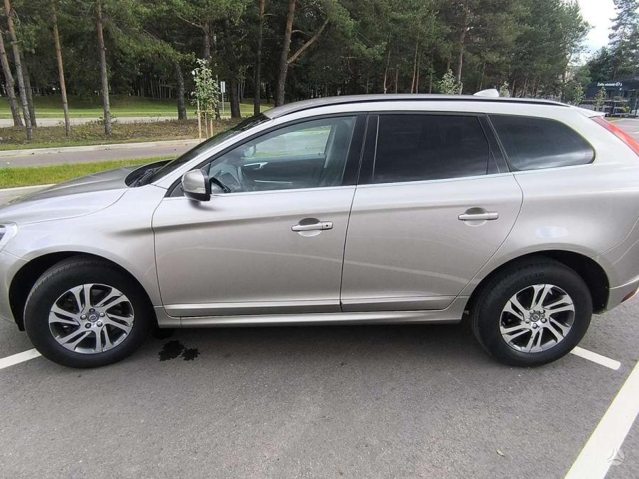 Yellow Volvo XC60 2015 in Utena, with an engine capacity of 2.00 L and mileage of 214 thousand km for 10850 €, photo 14 on AUTOMOTO.COM.LV