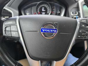 Yellow Volvo XC60 2015 in Utena, with an engine capacity of 2.00 L and mileage of 214 thousand km for 10850 €, photo 21 on AUTOMOTO.COM.LV