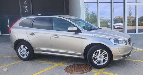 Yellow Volvo XC60 2016 in Vilnius, with an engine capacity of 2.40 L and mileage of 272 thousand km for 13540 €, photo 3 on AUTOMOTO.COM.LV