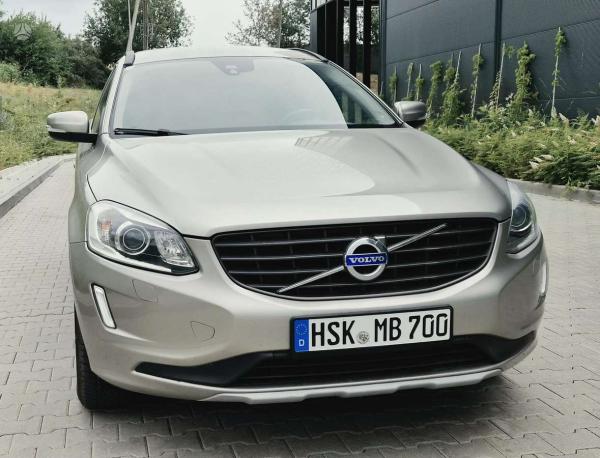 Yellow Volvo XC60 2016 in Vilnius, with an engine capacity of 2.40 L and mileage of 272 thousand km for 12399 €, photo 4 on AUTOMOTO.COM.LV