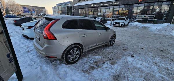 Yellow Volvo XC60 2017 in Kaunas, with an engine capacity of 2.40 L and mileage of 273 thousand km for 11500 €, photo 5 on AUTOMOTO.COM.LV