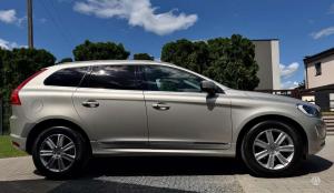 Yellow Volvo XC60 2017 in Kaunas, with an engine capacity of 2.00 L and mileage of 218 thousand km for 13900 €, photo 16 on AUTOMOTO.COM.LV