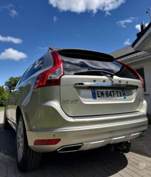 Yellow Volvo XC60 2017 in Kaunas, with an engine capacity of 2.00 L and mileage of 218 thousand km for 13900 €, photo 17 on AUTOMOTO.COM.LV