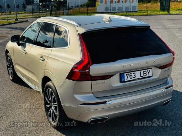 Yellow Volvo XC60 2021 in Tallinn, with an engine capacity of 2.00 L and mileage of 140 thousand km for 33950 €, photo 2 on AUTOMOTO.COM.LV
