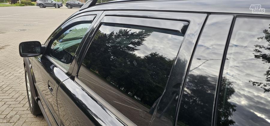 Black Volvo XC70 2004 in Trakai, with an engine capacity of 2.40 L and mileage of 375 thousand km for 2700 €, photo 10 on AUTOMOTO.COM.LV