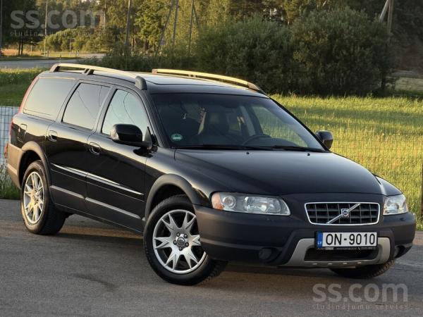 Black Volvo XC70 2007 in Ogre, with an engine capacity of 2.40 L and mileage of 347 thousand km for 5150 €, photo 1 on AUTOMOTO.COM.LV