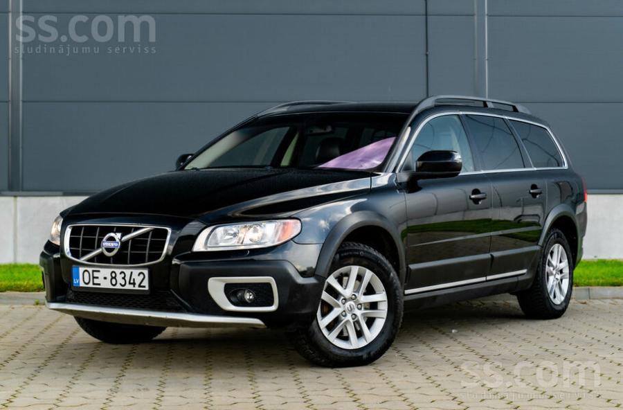 Black Volvo XC70 2008 in Riga, with an engine capacity of 2.40 L and mileage of 287 thousand km for 6990 €, photo 1 on AUTOMOTO.COM.LV