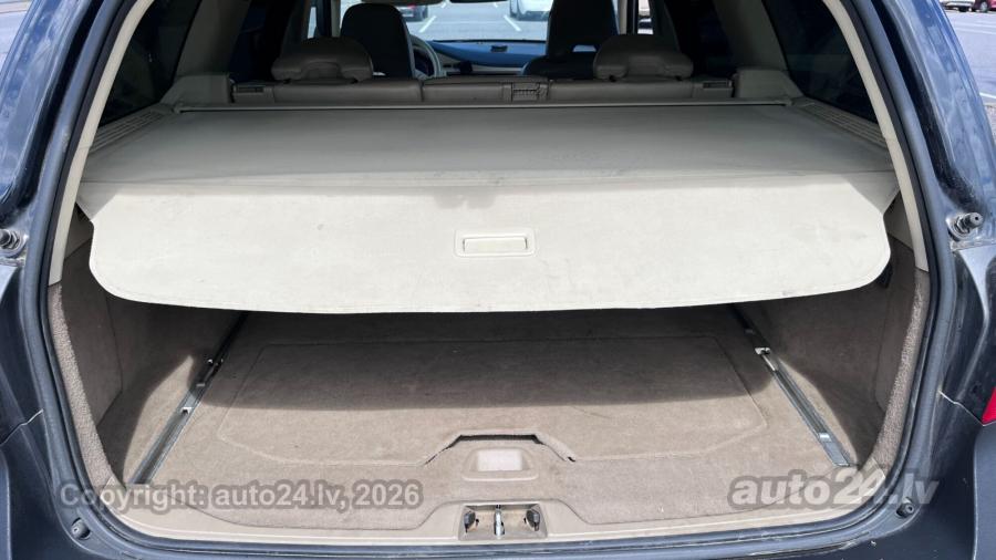 Black Volvo XC70 2009 in Tallinn, with an engine capacity of 2.40 L and mileage of 413 thousand km for 6490 €, photo 17 on AUTOMOTO.COM.LV