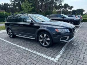 Black Volvo XC70 2012 in Riga, with an engine capacity of 2.40 L and mileage of 255 thousand km for 11995 €, photo  on AUTOMOTO.COM.LV