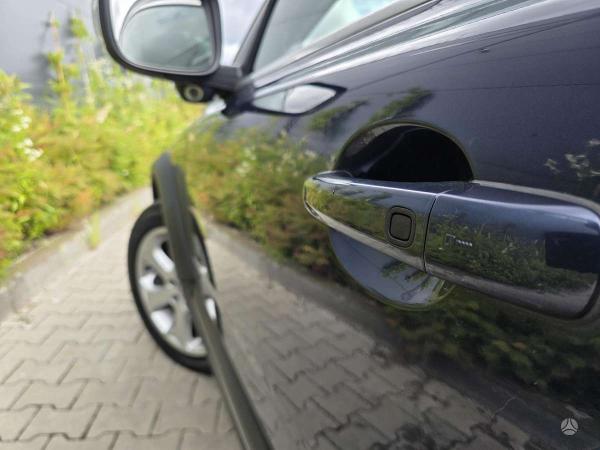 Blue Volvo XC70 2014 in Vilnius, with an engine capacity of 2.40 L and mileage of 259 thousand km for 15850 €, photo 10 on AUTOMOTO.COM.LV