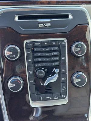 Brown Volvo XC70 2012 in Vilnius, with an engine capacity of 2.40 L and mileage of 470 thousand km for 6650 €, photo 23 on AUTOMOTO.COM.LV