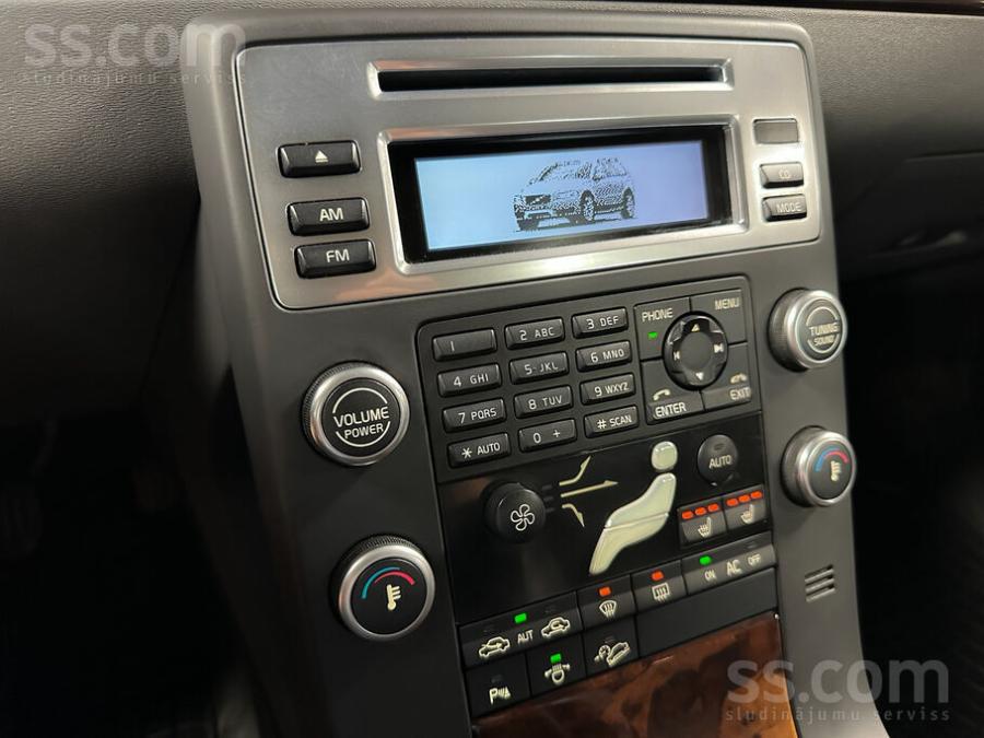 Brown Volvo XC70 2008 in Jurmala, with an engine capacity of 2.40 L and mileage of 305 thousand km for 7650 €, photo 23 on AUTOMOTO.COM.LV