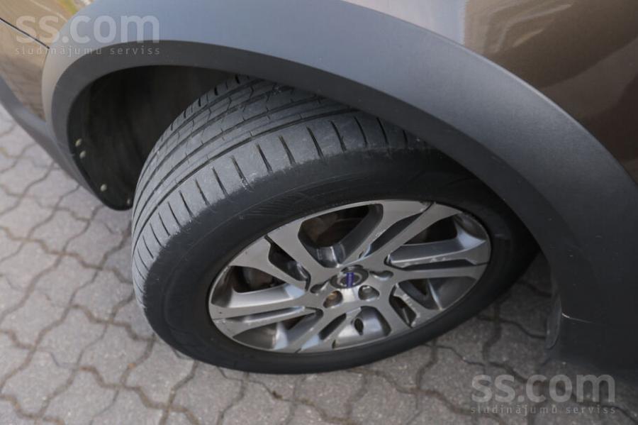 Brūns Volvo XC70 2014 Rīga, ar dzinēja tilpumu 2.00 L un nobraukumu 0 tūkst. km par 8990 €, foto 24 vietnē AUTOMOTO.COM.LV