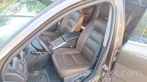 Brown Volvo XC70 2016 in Riga, with an engine capacity of 2.40 L and mileage of 318 thousand km for 10800 €, photo 10 on AUTOMOTO.COM.LV