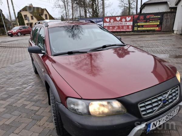 Sarkans Volvo XC70 2004 Ogre, ar dzinēja tilpumu 2.40 L un nobraukumu 413 tūkst. km par 3250 €, foto 1 vietnē AUTOMOTO.COM.LV