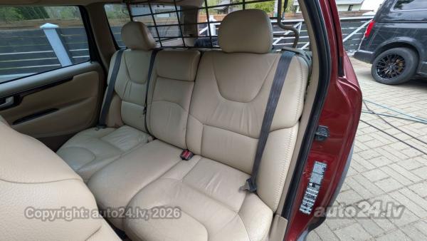 Red Volvo XC70 2003 in Tallinn, with an engine capacity of 2.40 L and mileage of 351 thousand km for 4500 €, photo 10 on AUTOMOTO.COM.LV