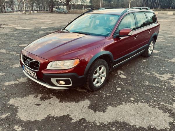 Red Volvo XC70 2011 in Riga, with an engine capacity of 2.40 L and mileage of 422 thousand km for 5300 €, photo 1 on AUTOMOTO.COM.LV
