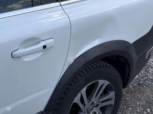 White Volvo XC70 2015 in Ukmerge, with an engine capacity of 1.97 L and mileage of 280 thousand km for 5600 €, photo 18 on AUTOMOTO.COM.LV