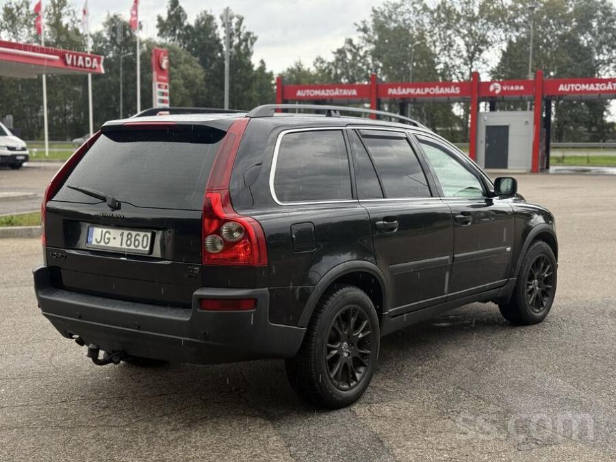 Black Volvo XC90 2004 in Riga, with an engine capacity of 2.40 L and mileage of 414 thousand km for 2990 €, photo 5 on AUTOMOTO.COM.LV