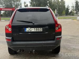 Black Volvo XC90 2004 in Riga, with an engine capacity of 2.40 L and mileage of 414 thousand km for 2990 €, photo 6 on AUTOMOTO.COM.LV